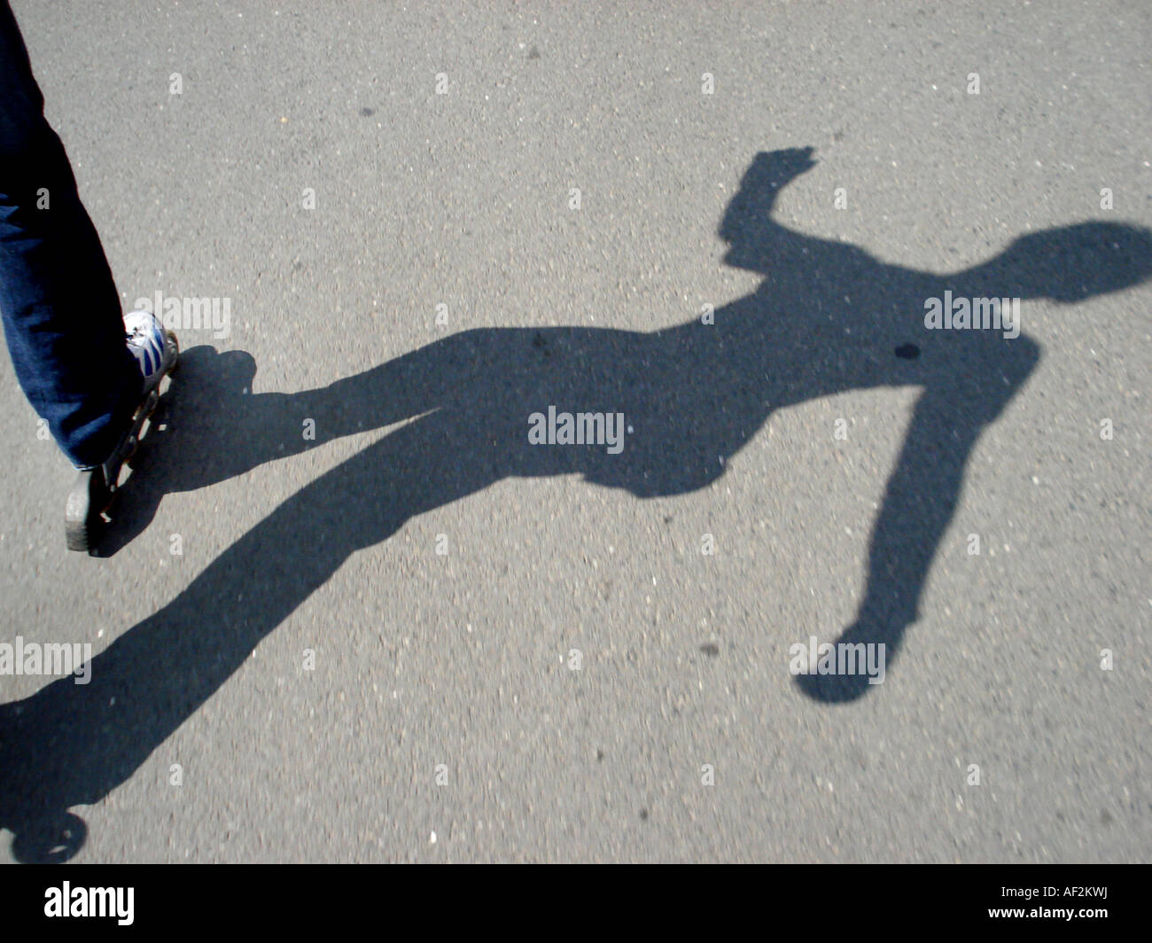 shadow of a runner Stock Photo - Alamy
