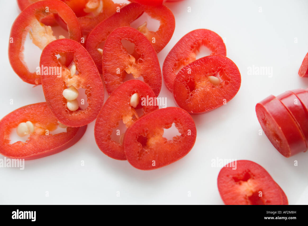 A close-up shot of slices of a hot red chilli pepper Stock Photo - Alamy