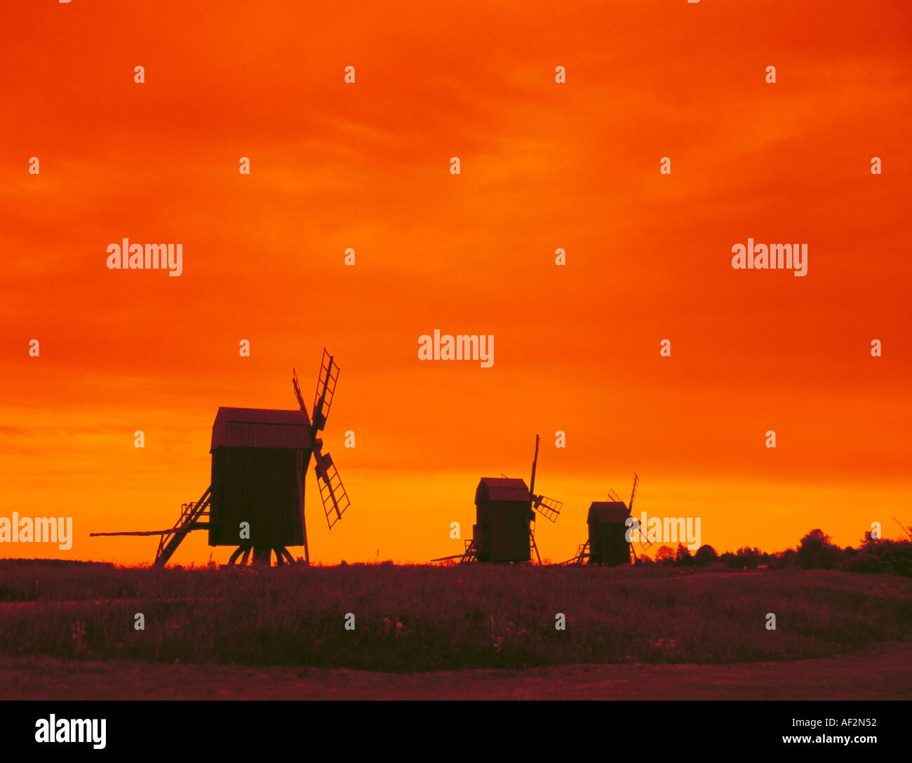 Three windmills; traditional post mill wooden windmills, Lerkaka, Öland ...