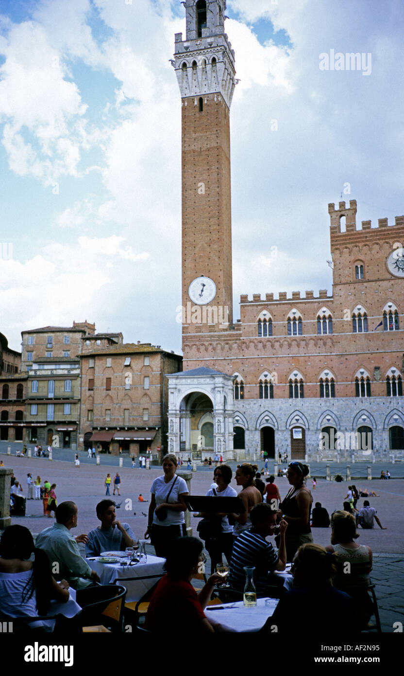 Siena Il Campo main square in sunset with people Stock Photo - Alamy