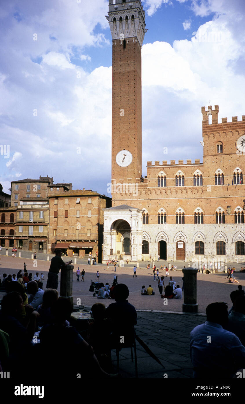Siena Il Campo main square in sunset with people Stock Photo - Alamy