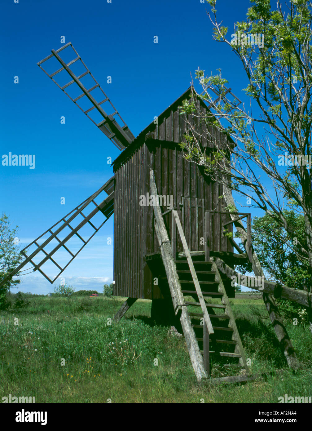 Traditional post mill wooden windmill, southern Öland, Sweden Stock ...
