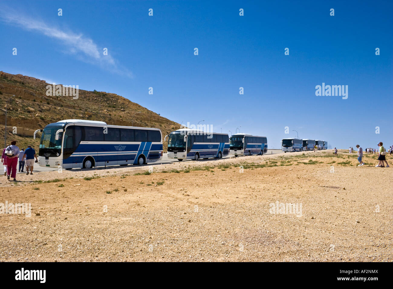 Line of tour buses and tourists at Petra Jordan AH0004 Stock Photo - Alamy