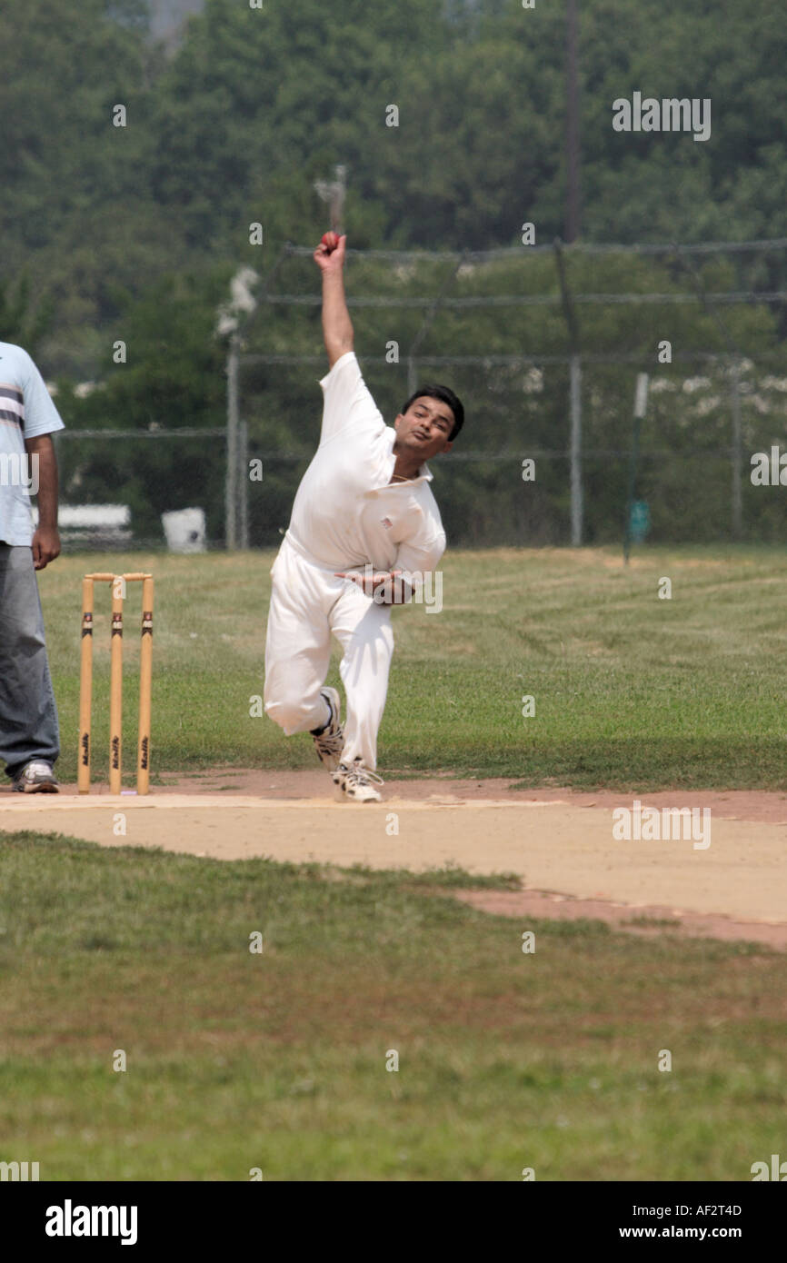 Bowler throws his pitch in Cricket Stock Photo - Alamy