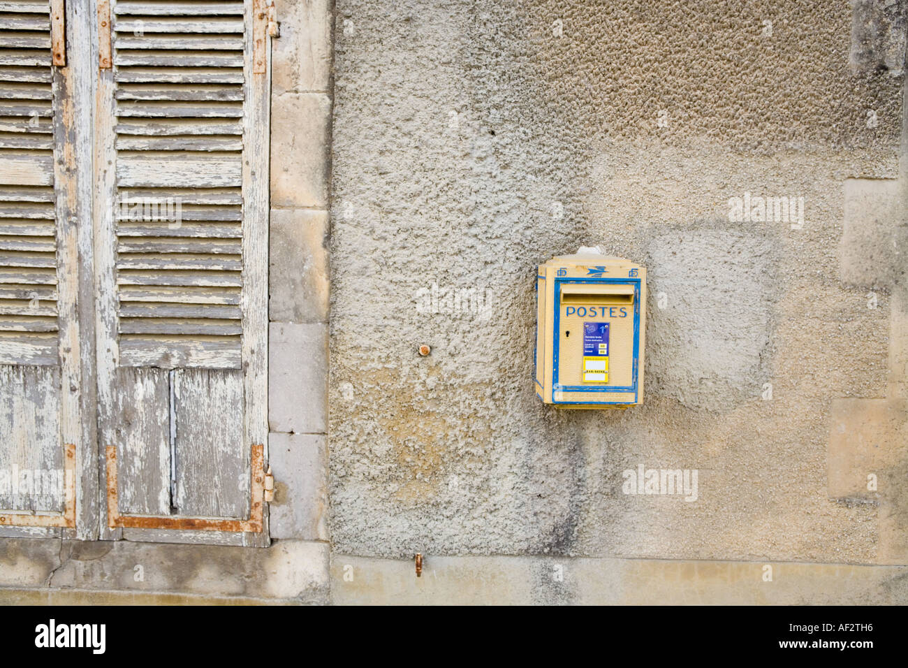 French Window Shutter and Post Box Stock Photo - Alamy