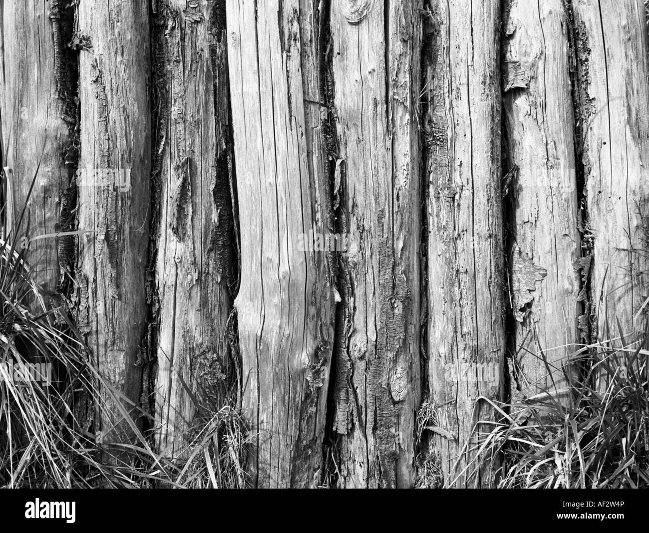 Close-up of an old log fence Stock Photo - Alamy