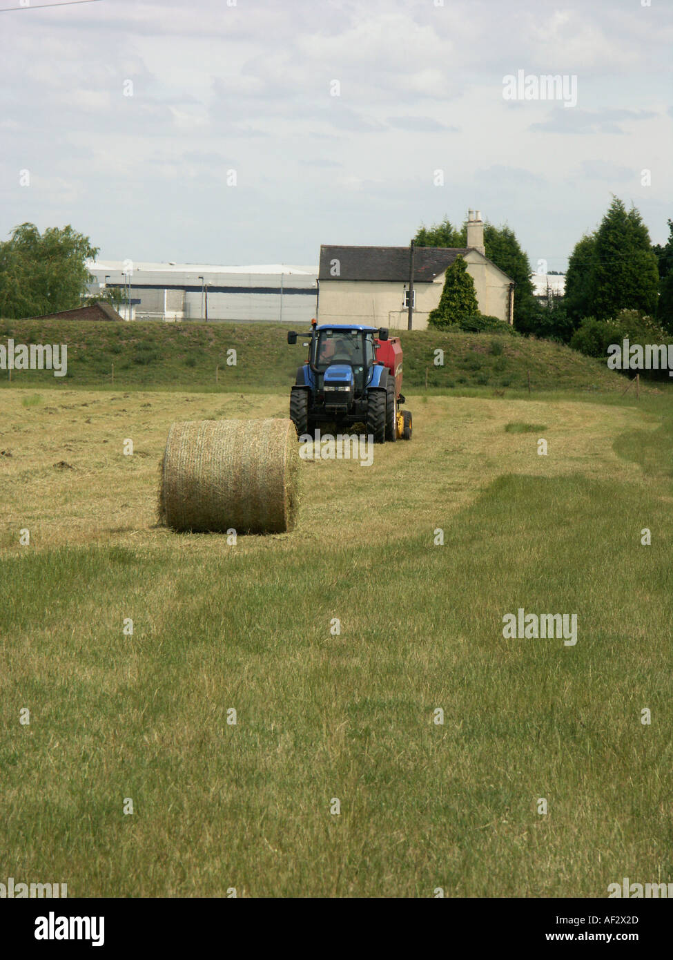 Hay making and baling British Countryside Bales. Round bales in a field ...