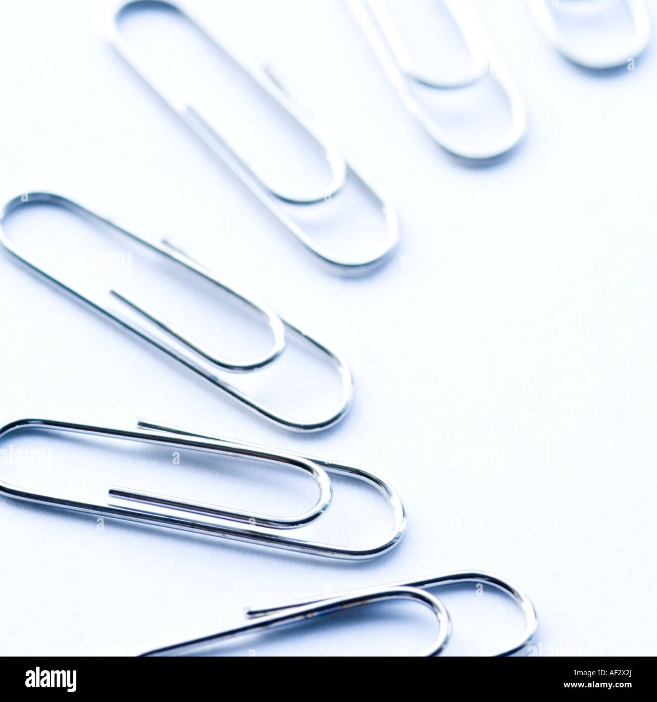Paper Clips on white background Stock Photo - Alamy