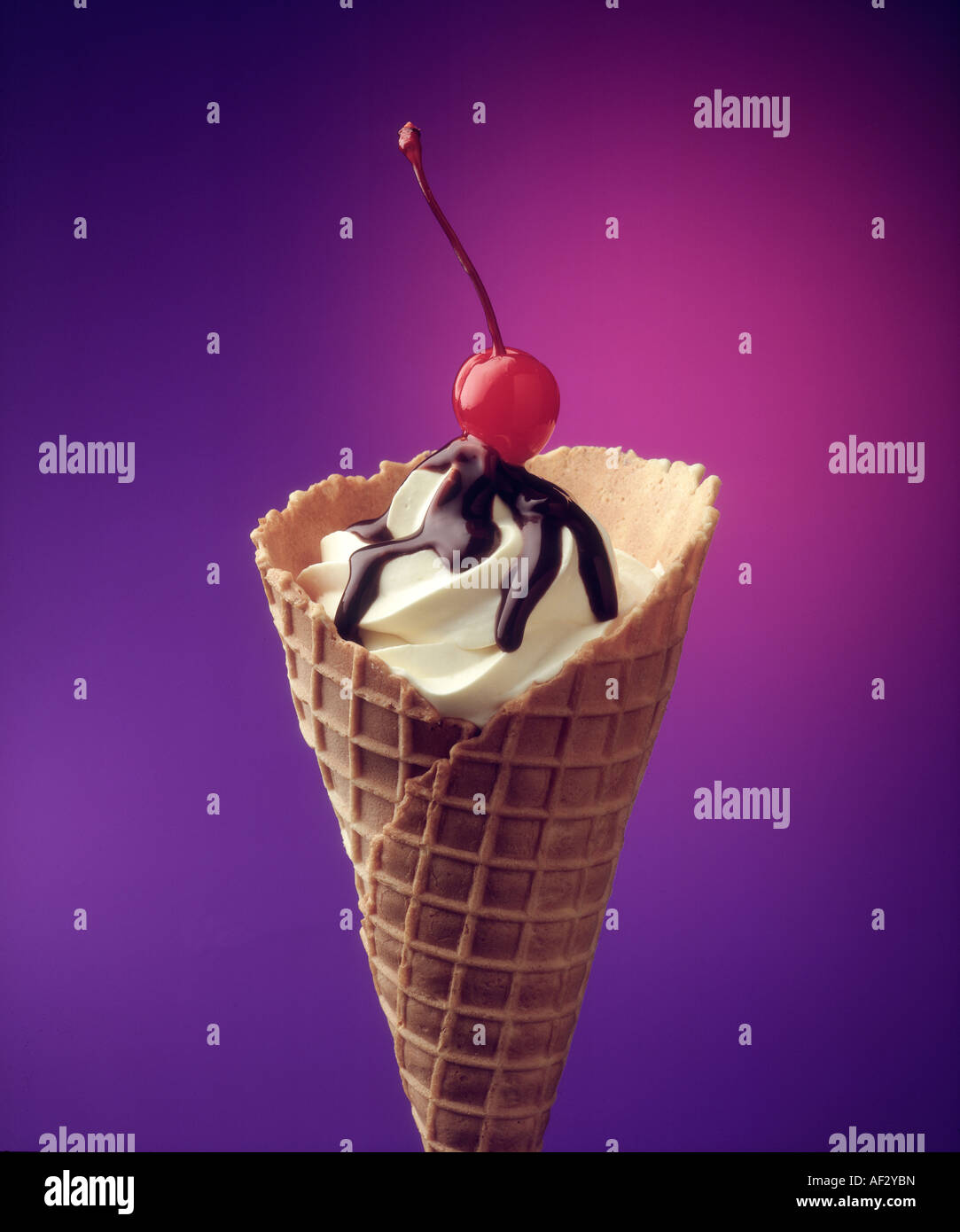 Frozen Yogurt Waffle Cone w/Hot Fudge and Cherry Stock Photo - Alamy