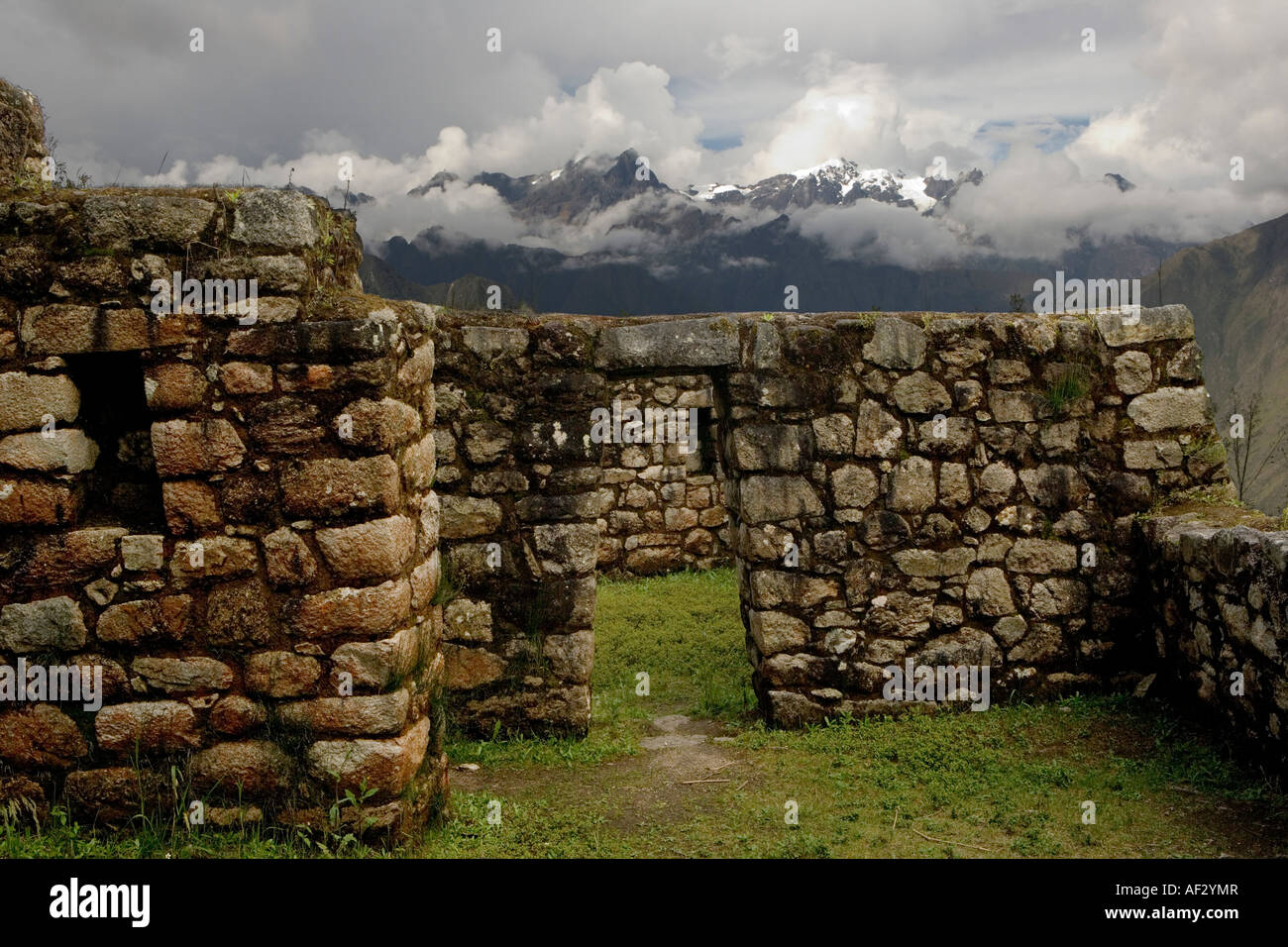 Building remains at the Intipata ruins, with snow covered Andes ...