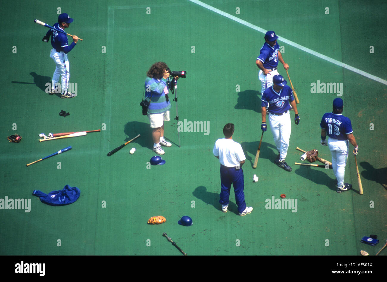 Sports Photographer with Blue Jays team members in Toronto Skydome ...