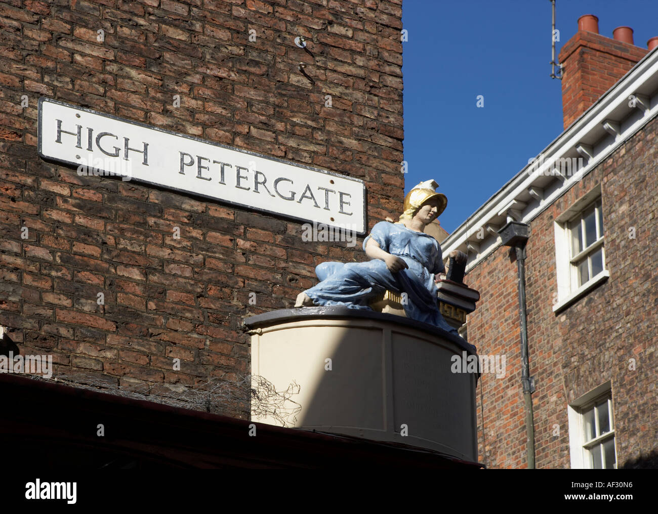 STATUE OF THE GODDESS MINERVA ON CORNER OF HIGH PETERGATE STREET YORK ...