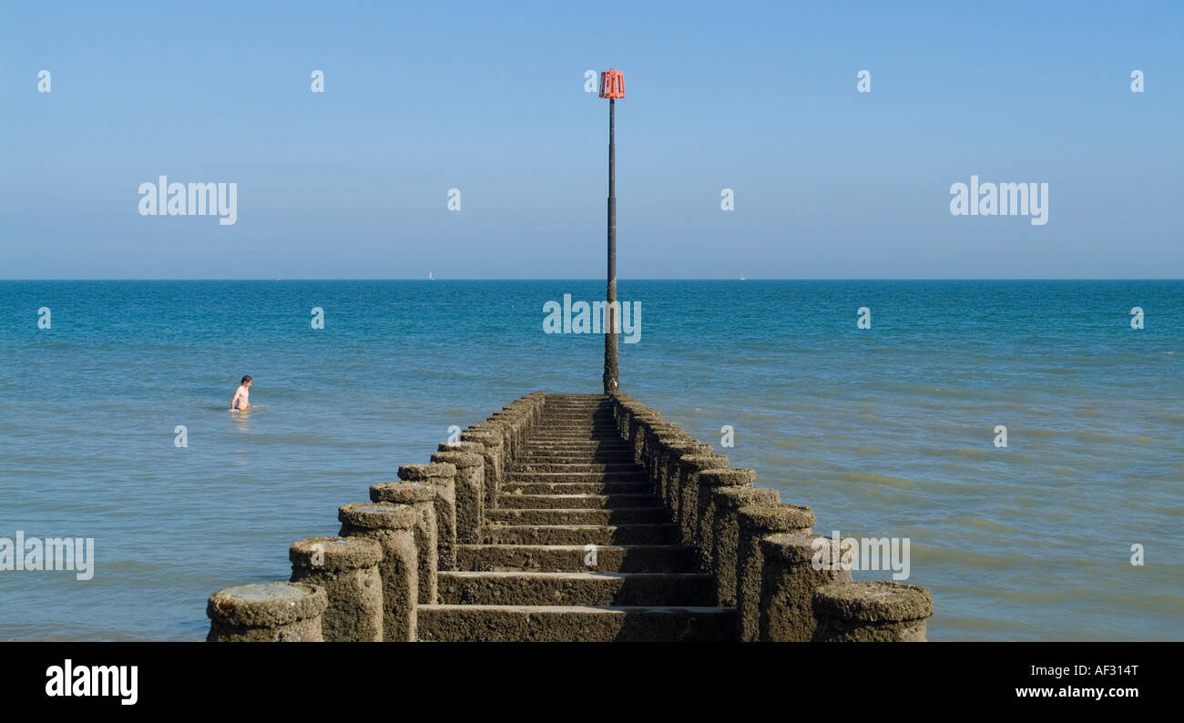 Boy wading in the sea, Eastbourne, East Sussex, England Stock Photo - Alamy