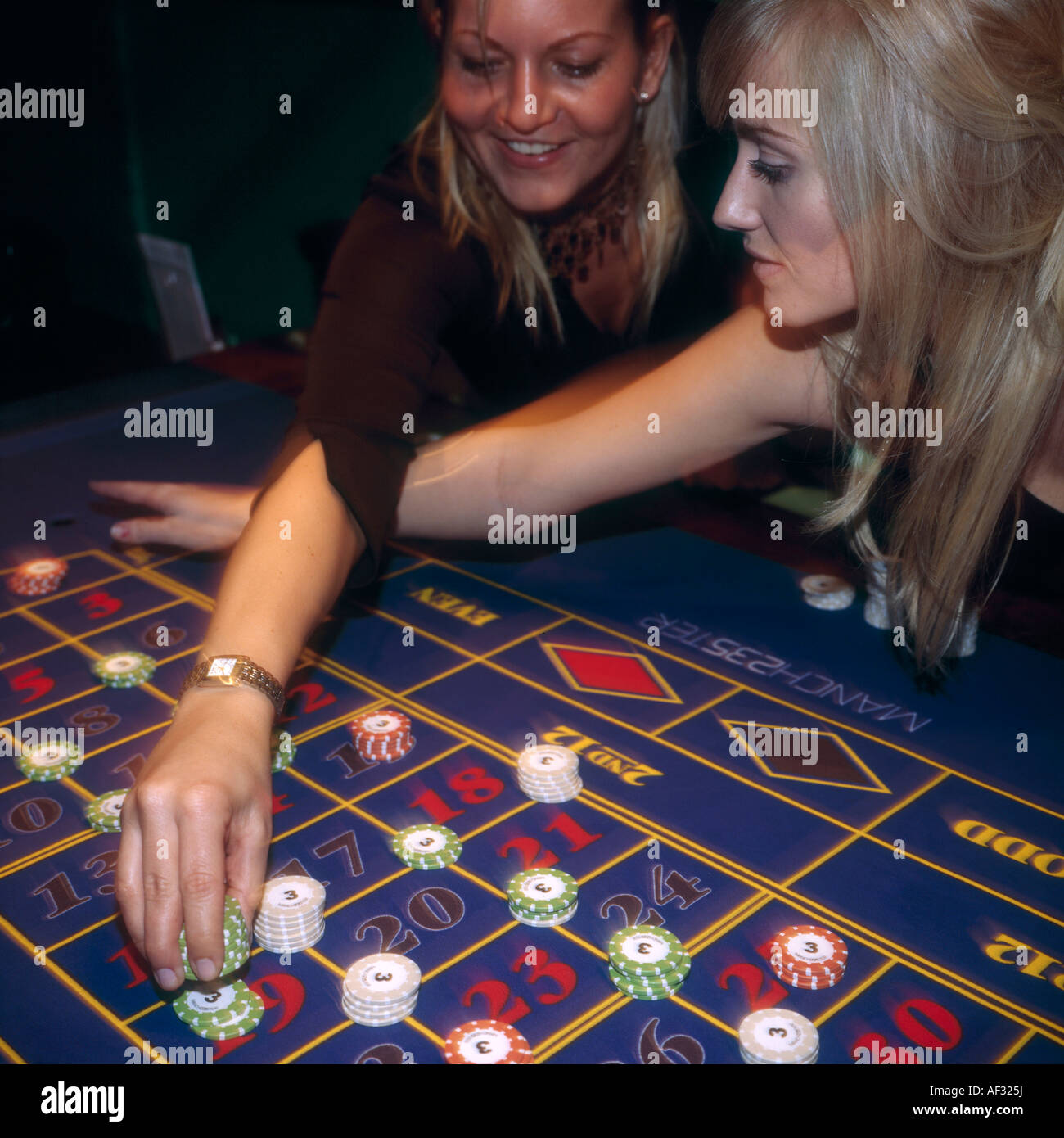 Placing bet on roulette table hi-res stock photography and images - Alamy