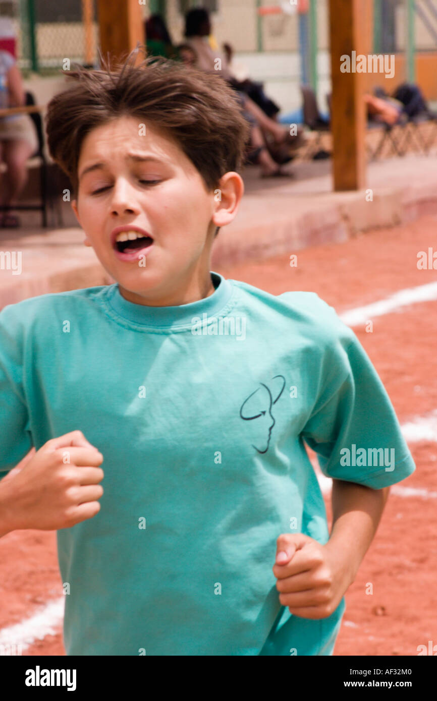 school boy running at school sports day Stock Photo - Alamy
