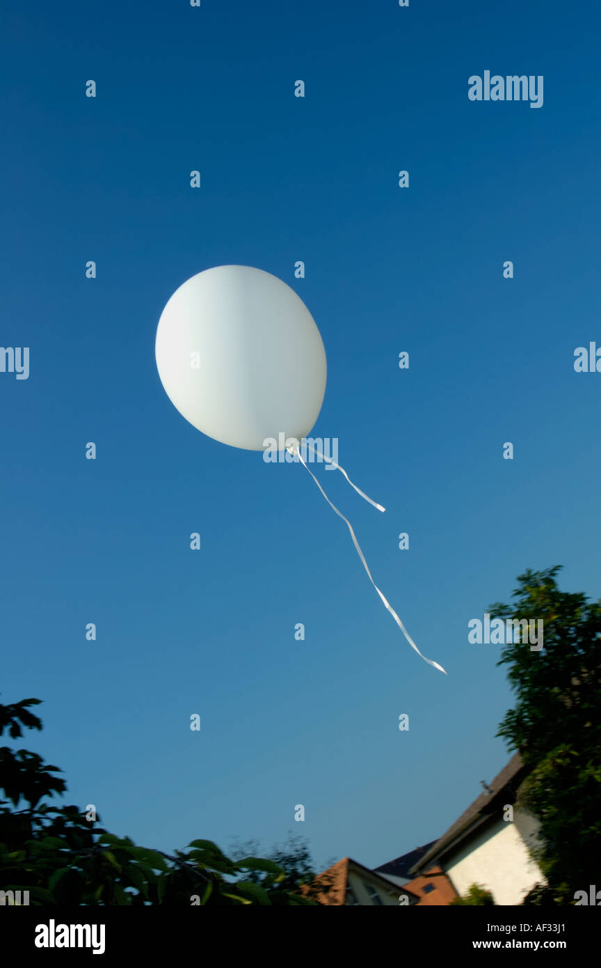 Child escaped balloon sky hi-res stock photography and images - Alamy