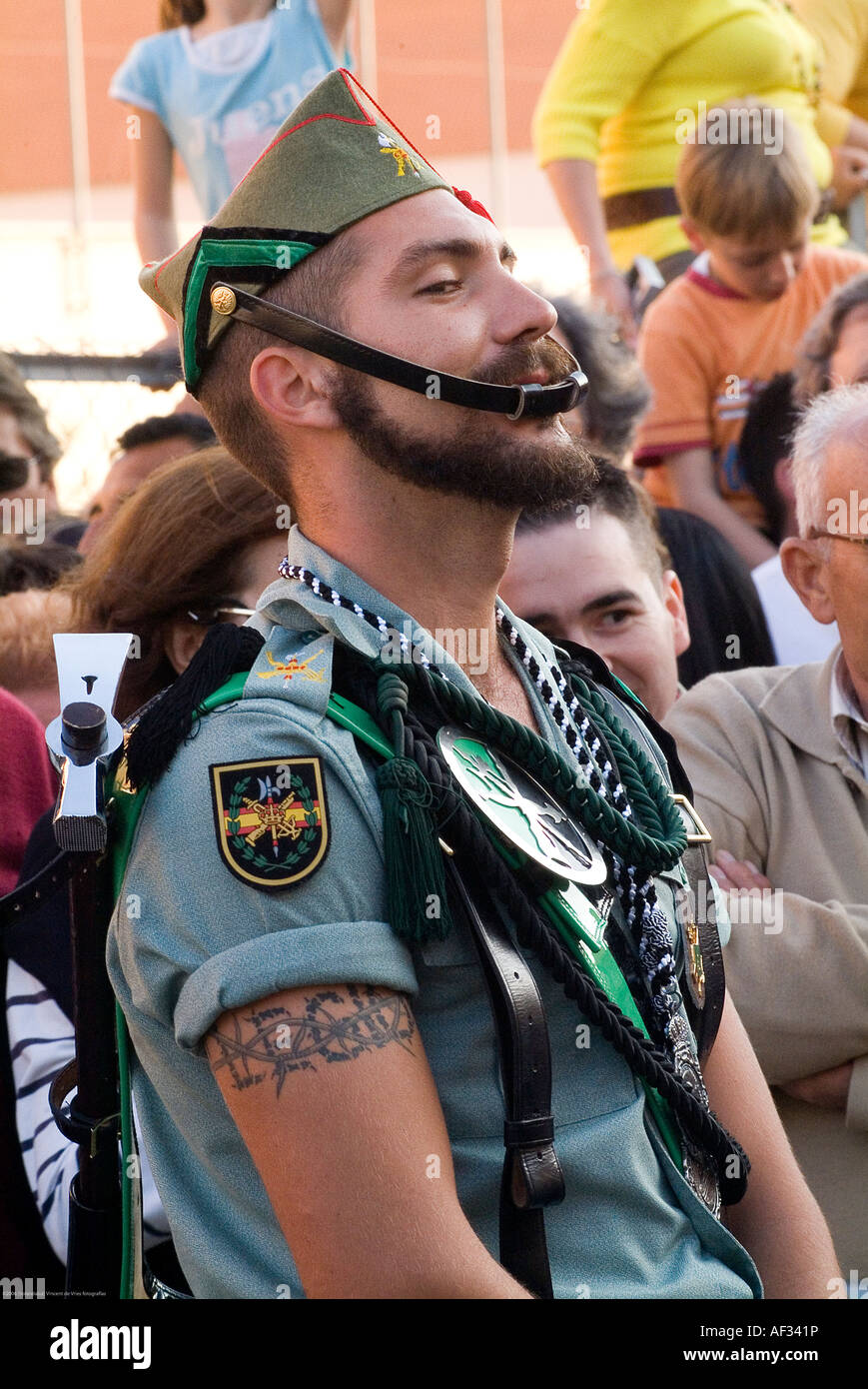 Legionnaire (legionario) waiting for the procession to begin during the ...
