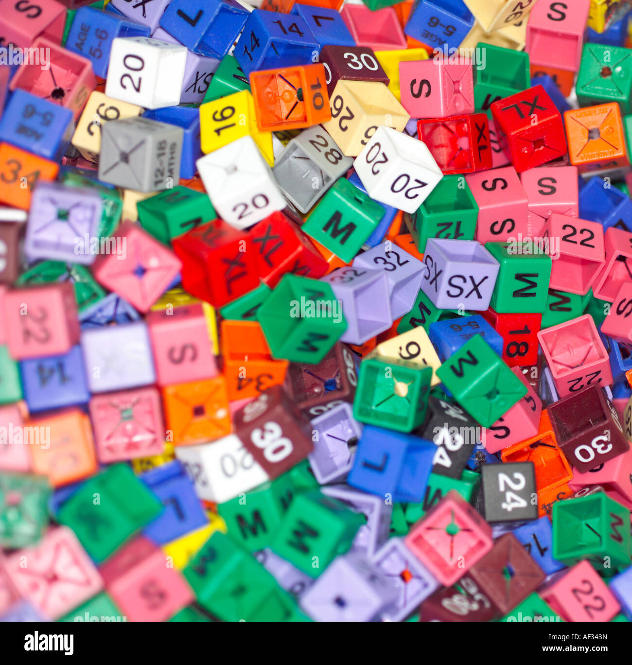 Sizing clothing hi-res stock photography and images - Alamy