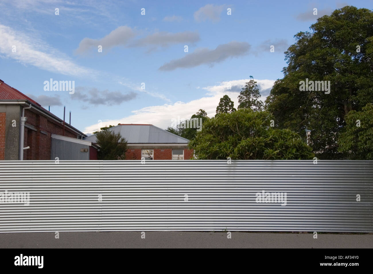 Corrugated metal fence trees hi-res stock photography and images - Alamy