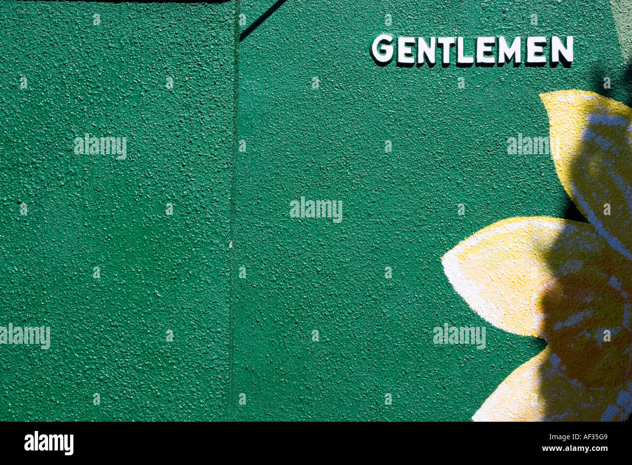 gentlemen sign with flower Stock Photo - Alamy