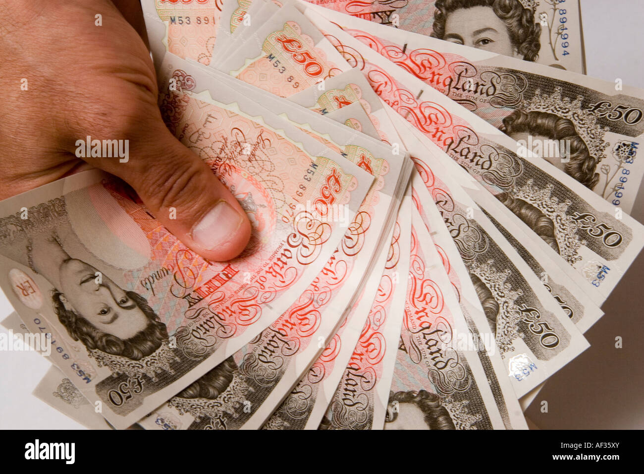 50 pound notes pile hi-res stock photography and images - Alamy