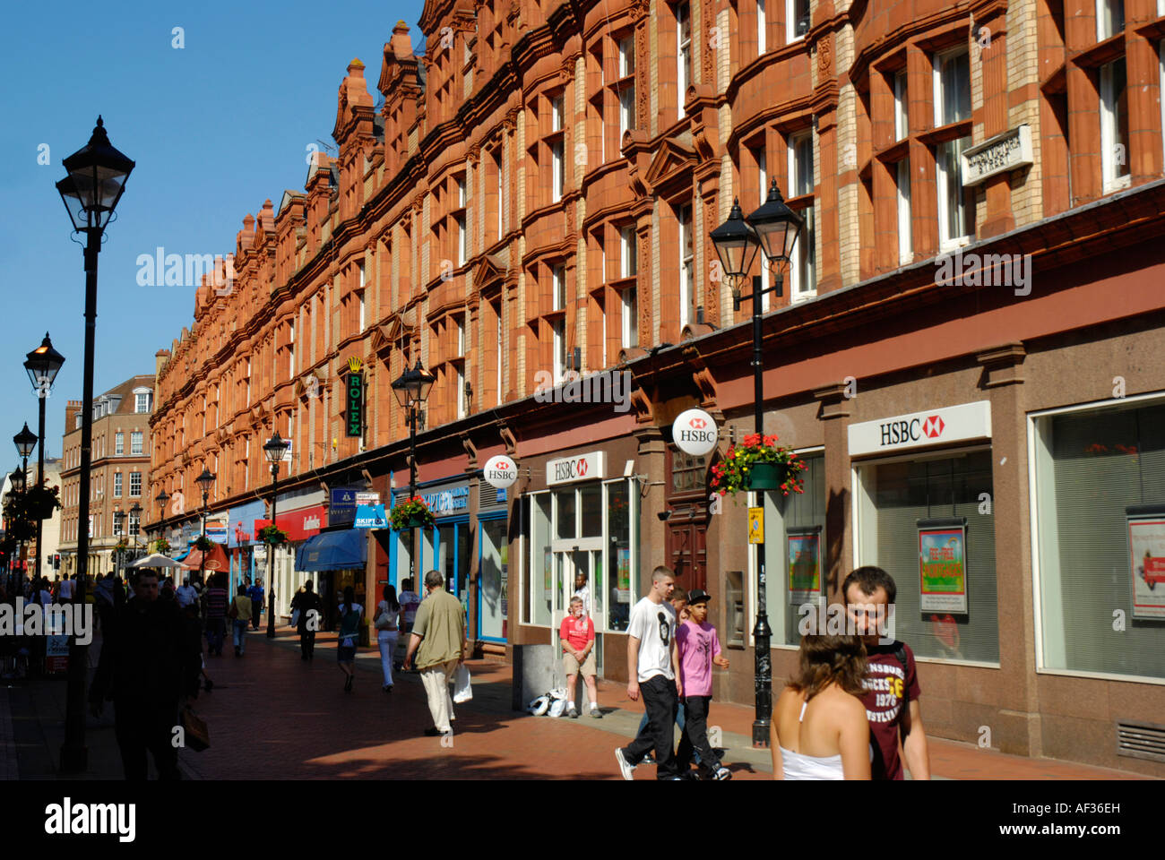 View along Queen Victoria Street showing Victorian red brick buildings ...