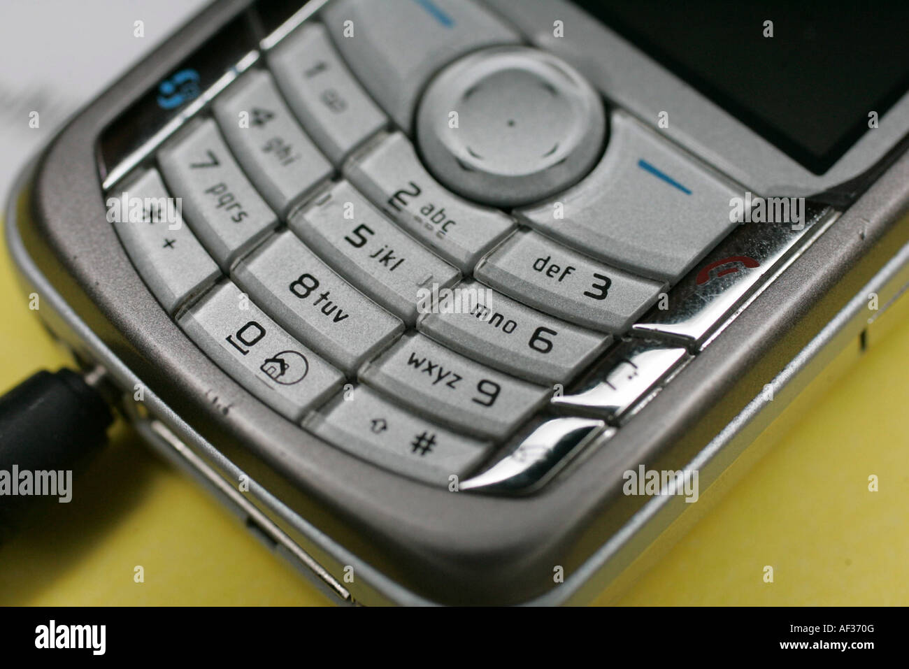 A mobile phone Nokia pictured against a yellow background Stock Photo ...