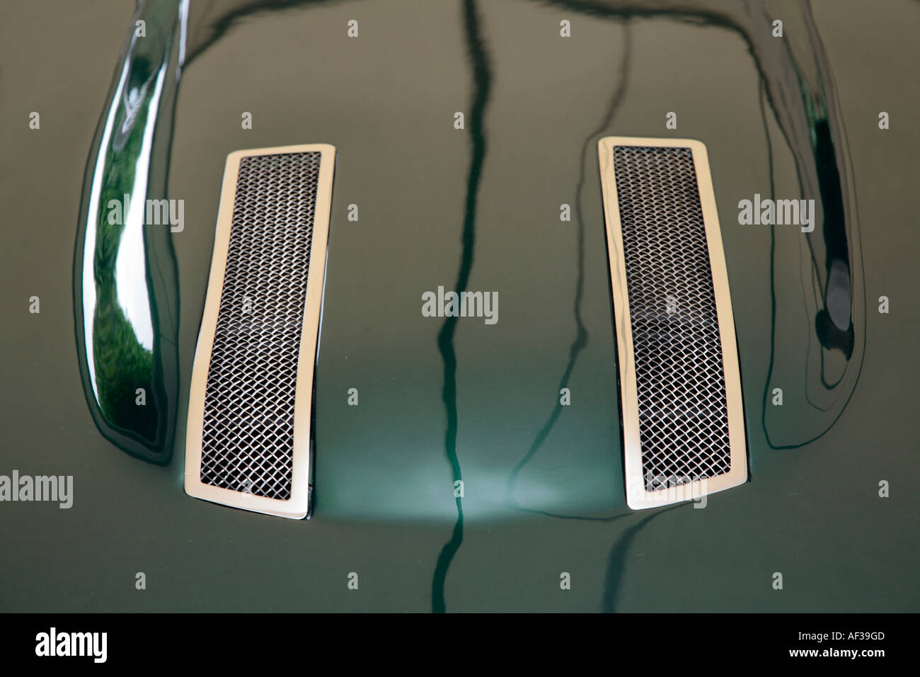 Green bonnet and grilled air intakes Stock Photo - Alamy