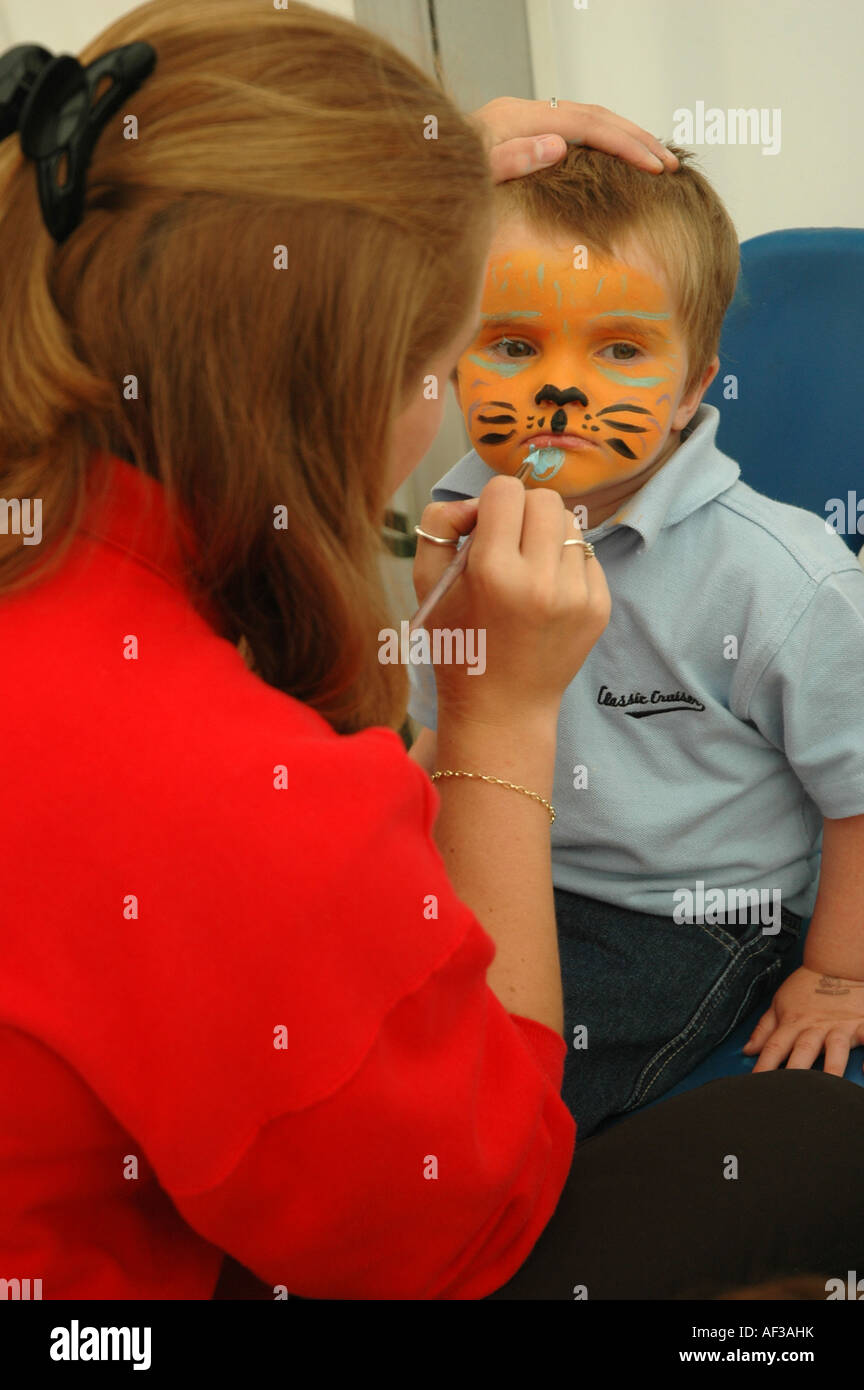 Little Boy Having His Face Painted Stock Photo - Alamy