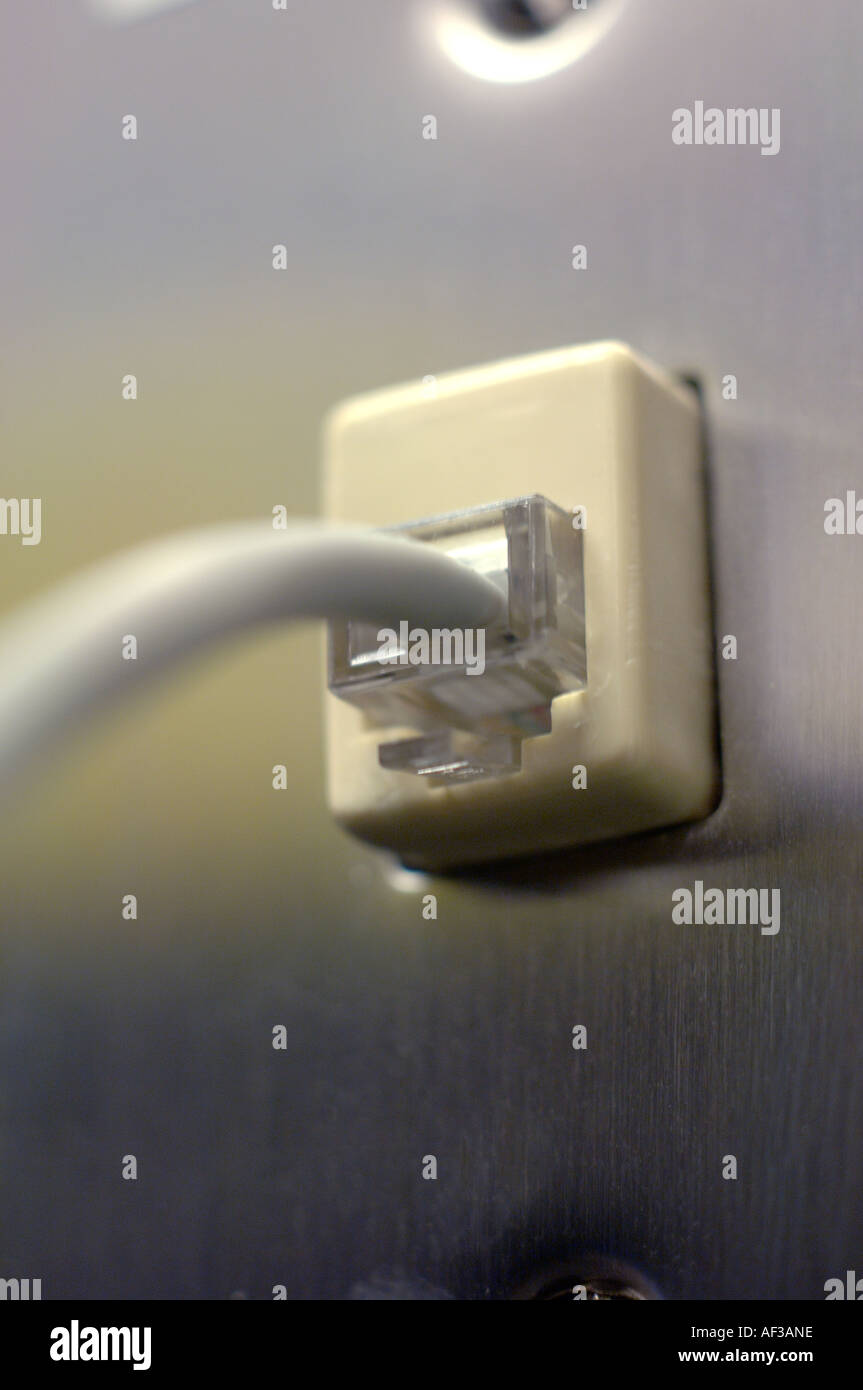 Plugged into outlet hi-res stock photography and images - Alamy