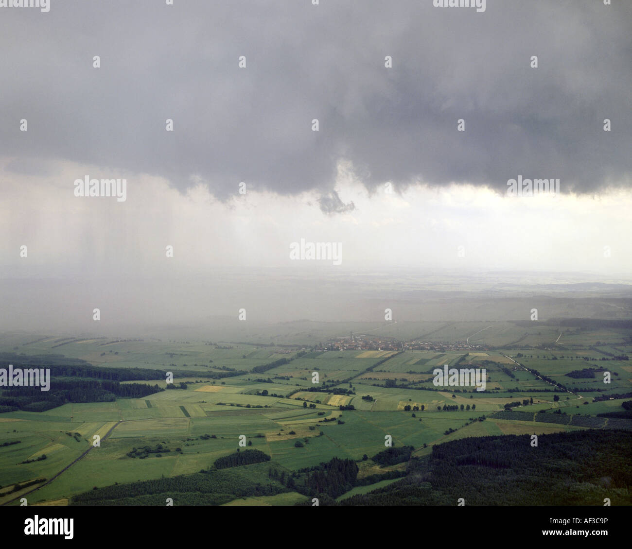 Rain clouds over cultural landscape hi-res stock photography and images ...