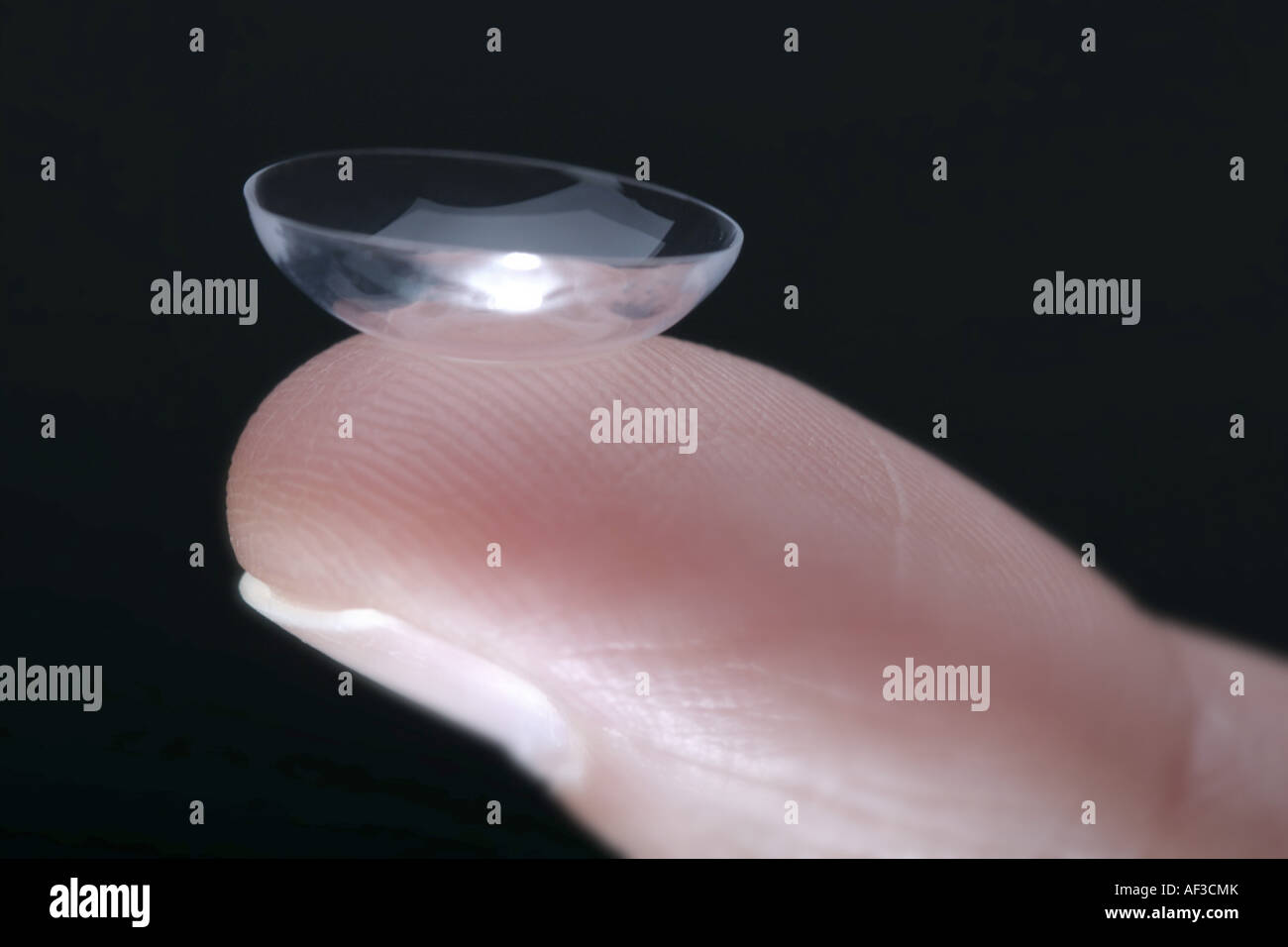 contact lens on finger Stock Photo - Alamy