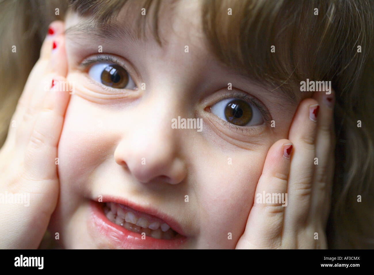 child catching the head Stock Photo - Alamy