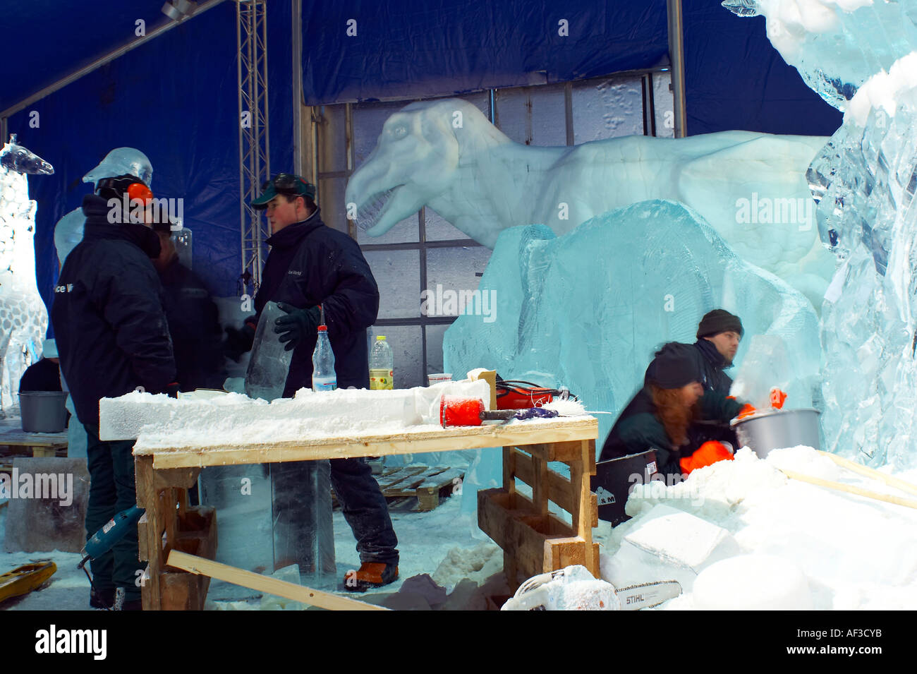 Ice sculptures carving. During the work Stock Photo - Alamy