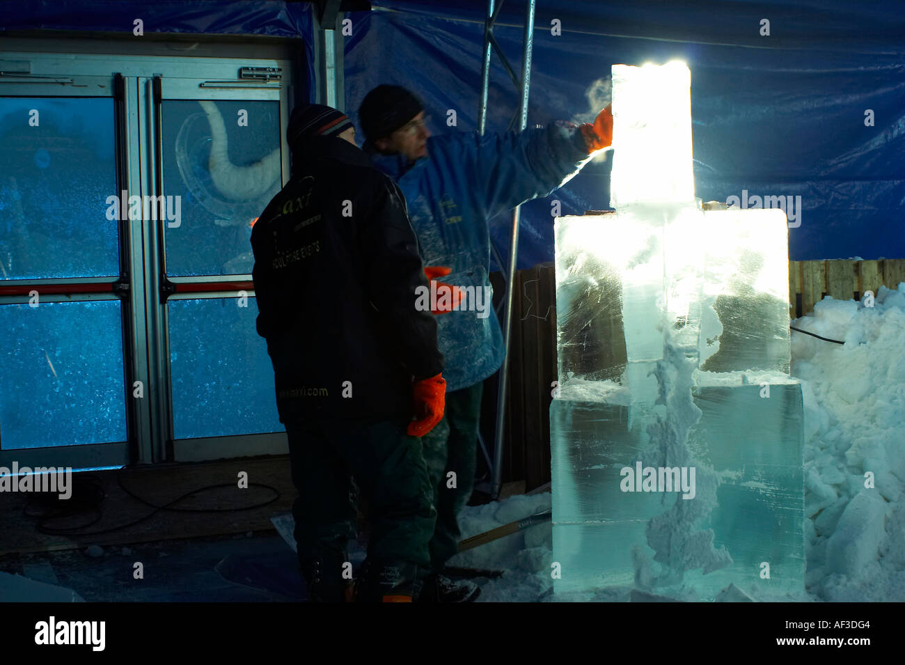 Ice sculptures carving. During the work Stock Photo - Alamy
