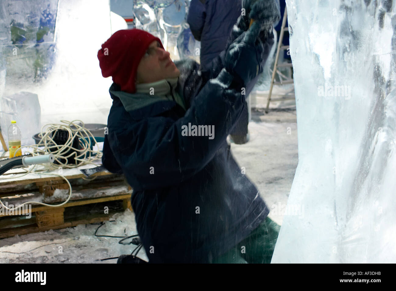 Ice sculptures carving. During the work Stock Photo - Alamy