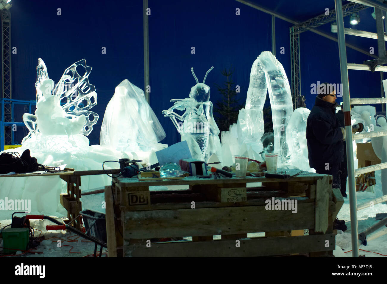 Ice sculptures carving. During the work Stock Photo - Alamy