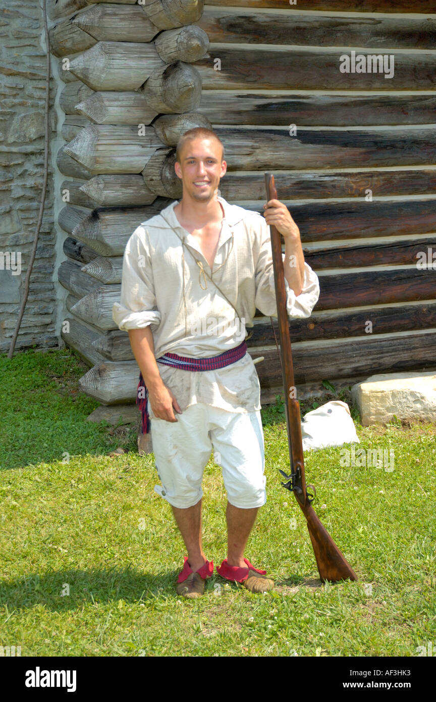 Frontier soldier reenactor with his flintlock rifle at Fort ...