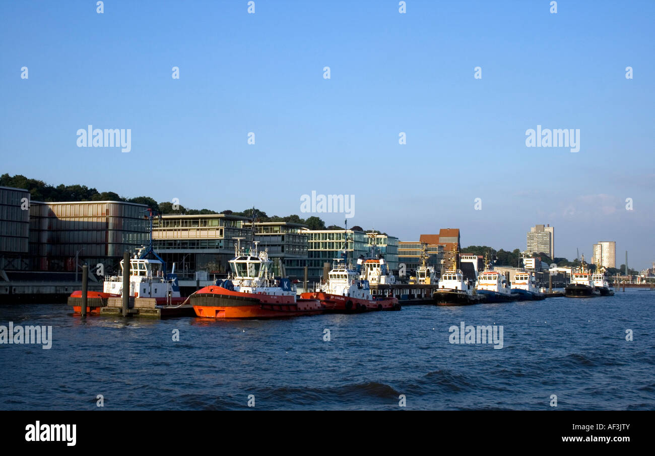 Harbour tugs moored alongside Stock Photo - Alamy