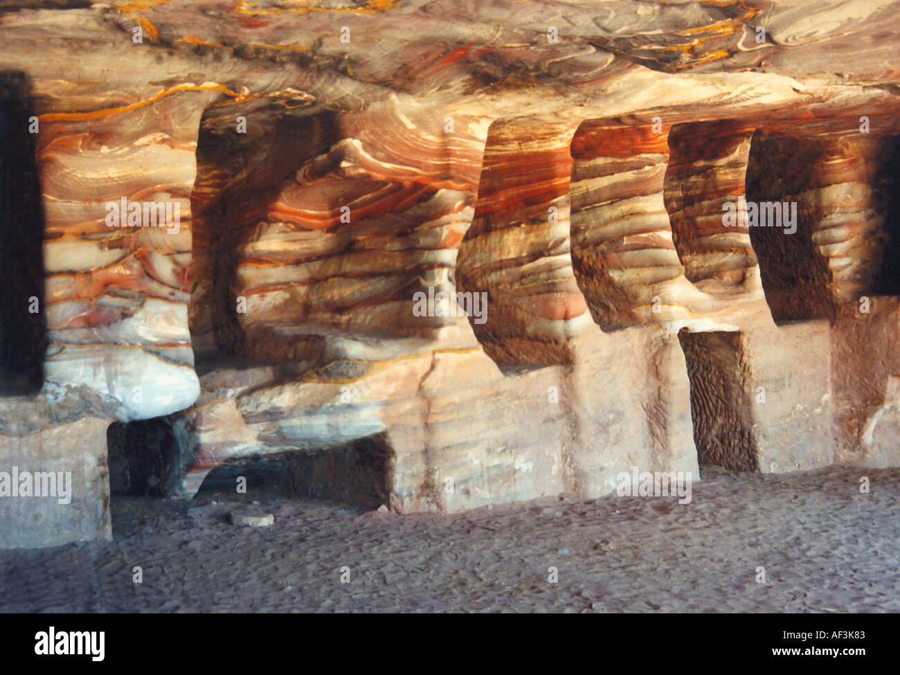 Carved spaces as either tombs or living sleeping spaces in the rock ...