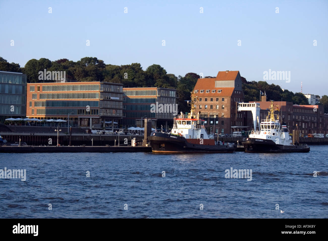 Harbour tugs moored alongside Stock Photo - Alamy