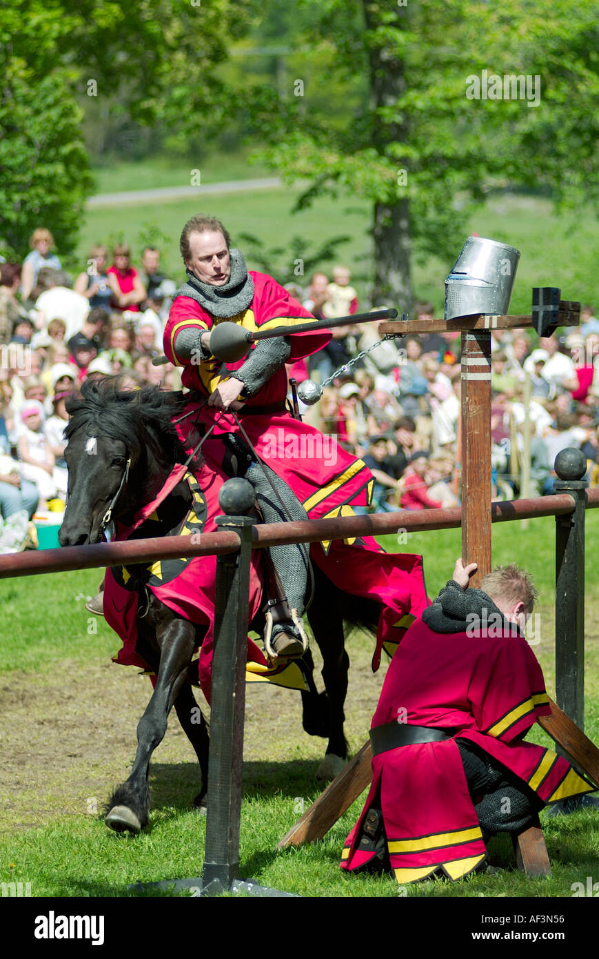 Knight riding horse Stock Photo - Alamy