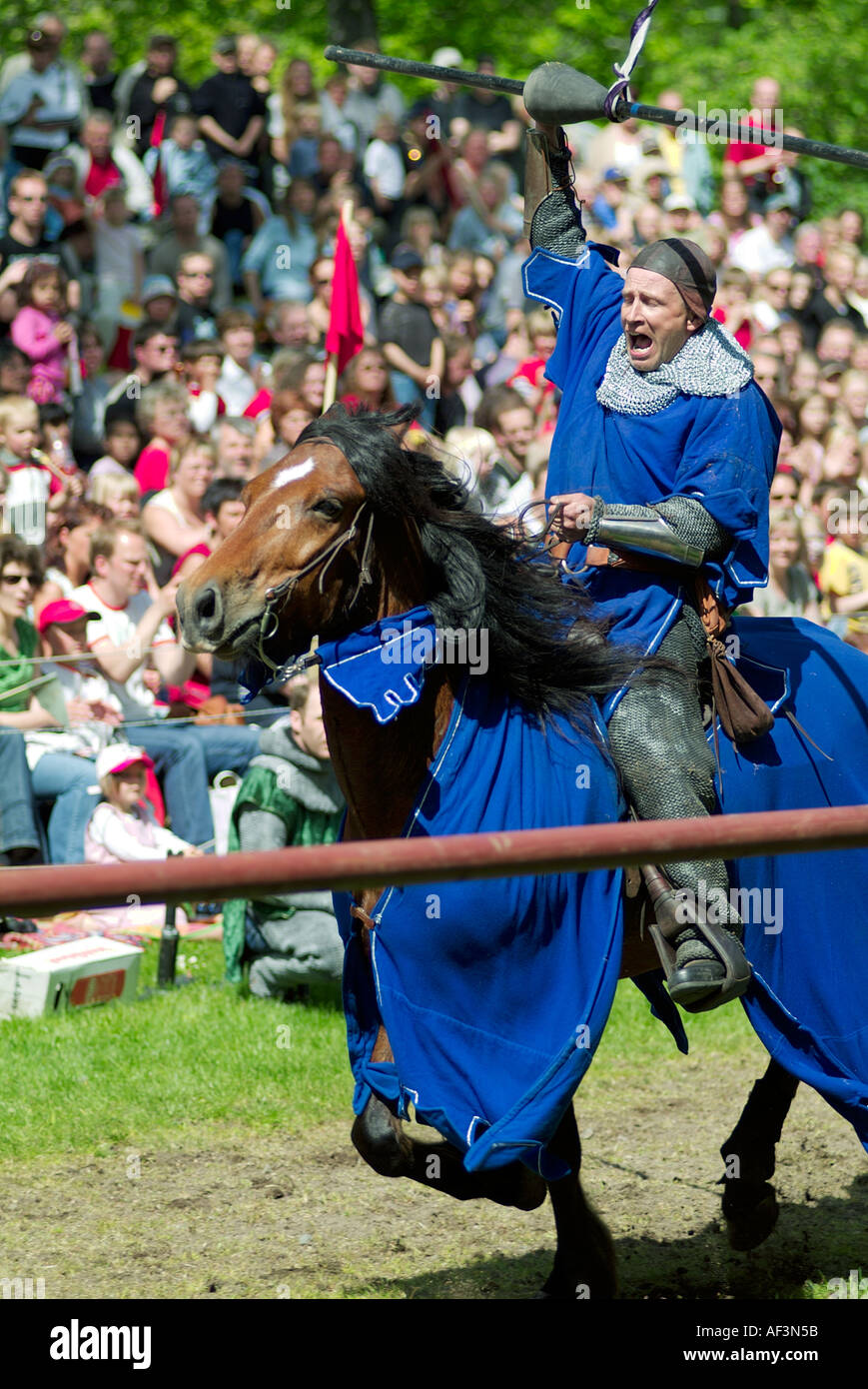 Knight riding horse Stock Photo - Alamy