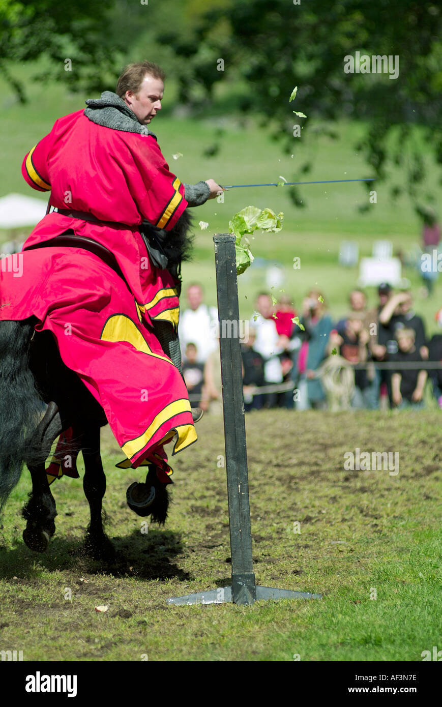 Knight riding horse Stock Photo - Alamy