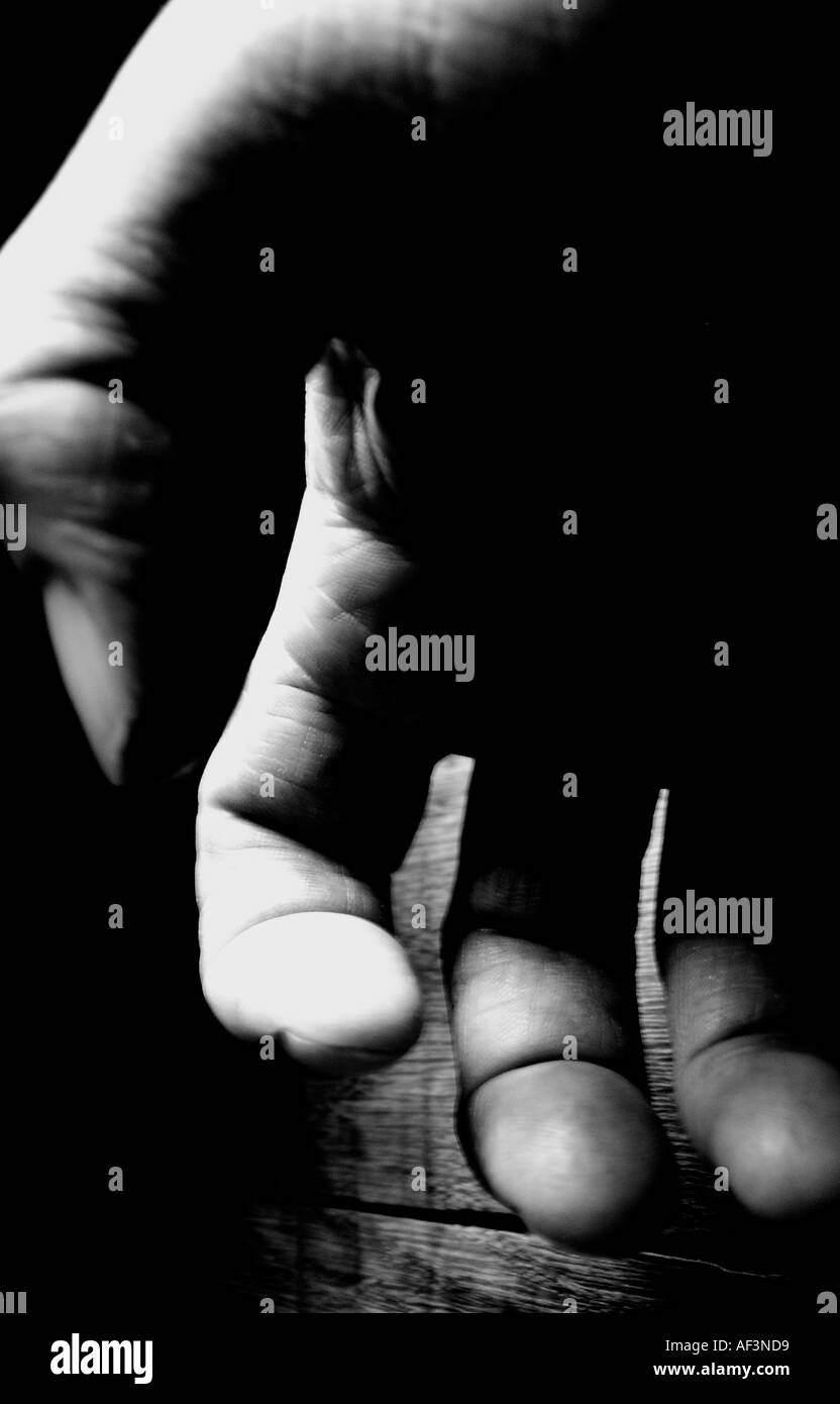 Hand grasping Black and White Stock Photos & Images - Alamy