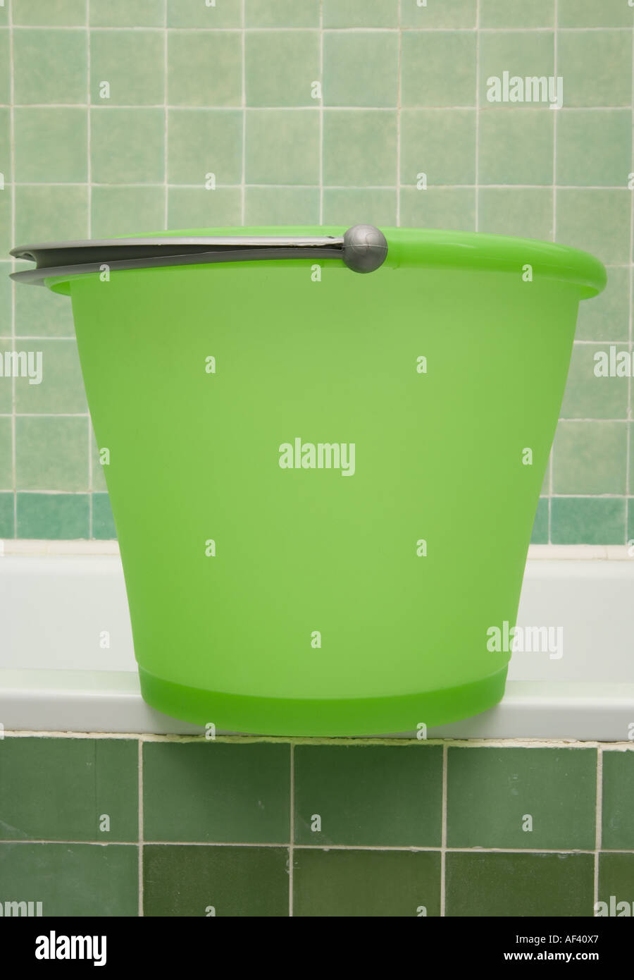 One bucket on a bath Stock Photo - Alamy