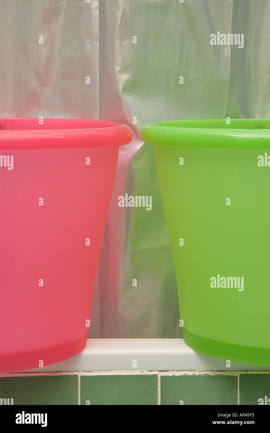 Two buckets on bath Stock Photo - Alamy
