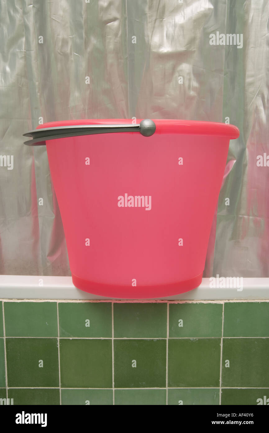 Bucket on bath Stock Photo - Alamy