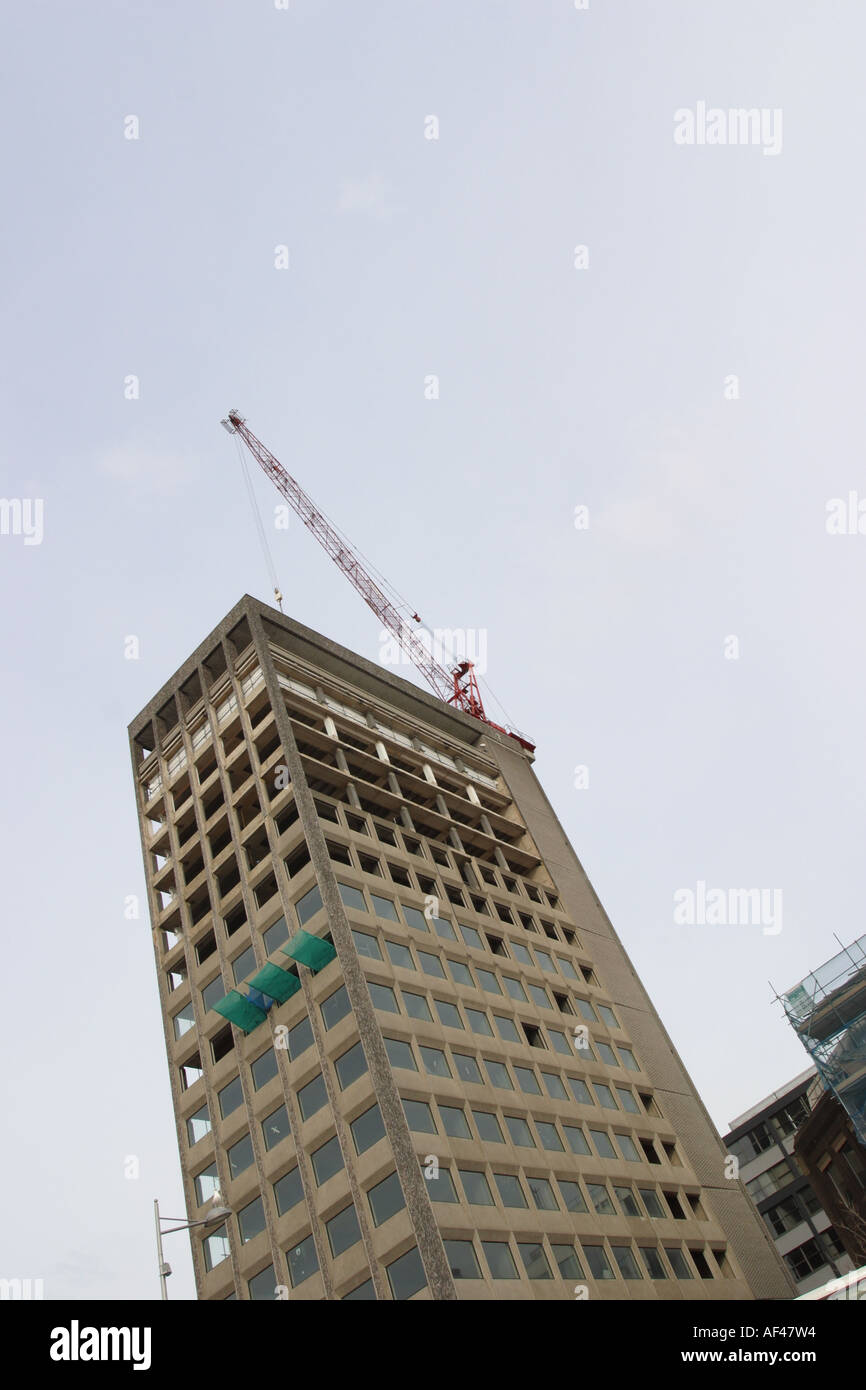 Office tower block high rise being demolished Stock Photo - Alamy