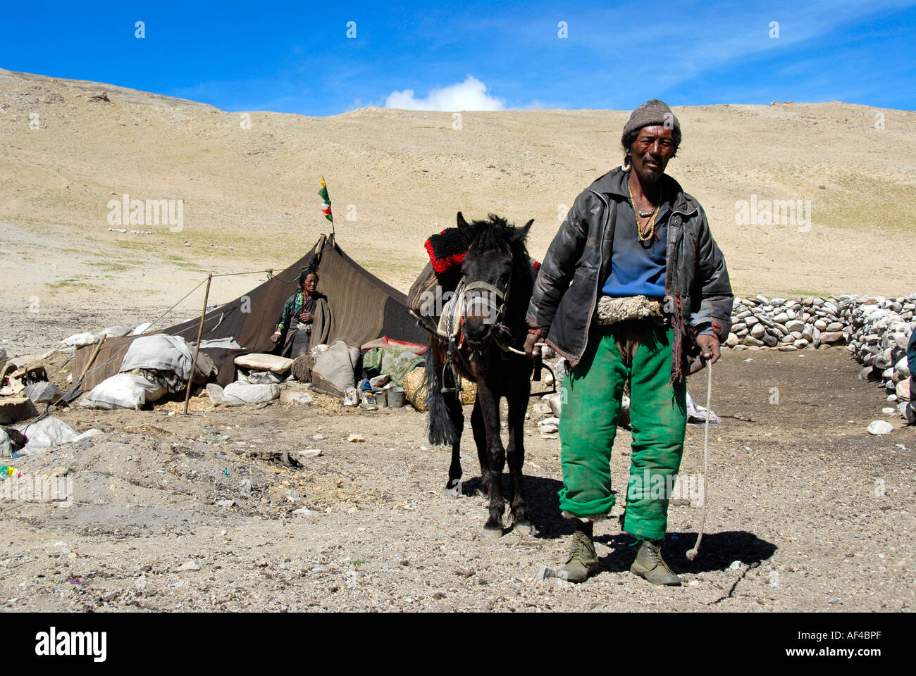 Tibetan Nomads man with horse in front of the tent Everest region Tibet ...